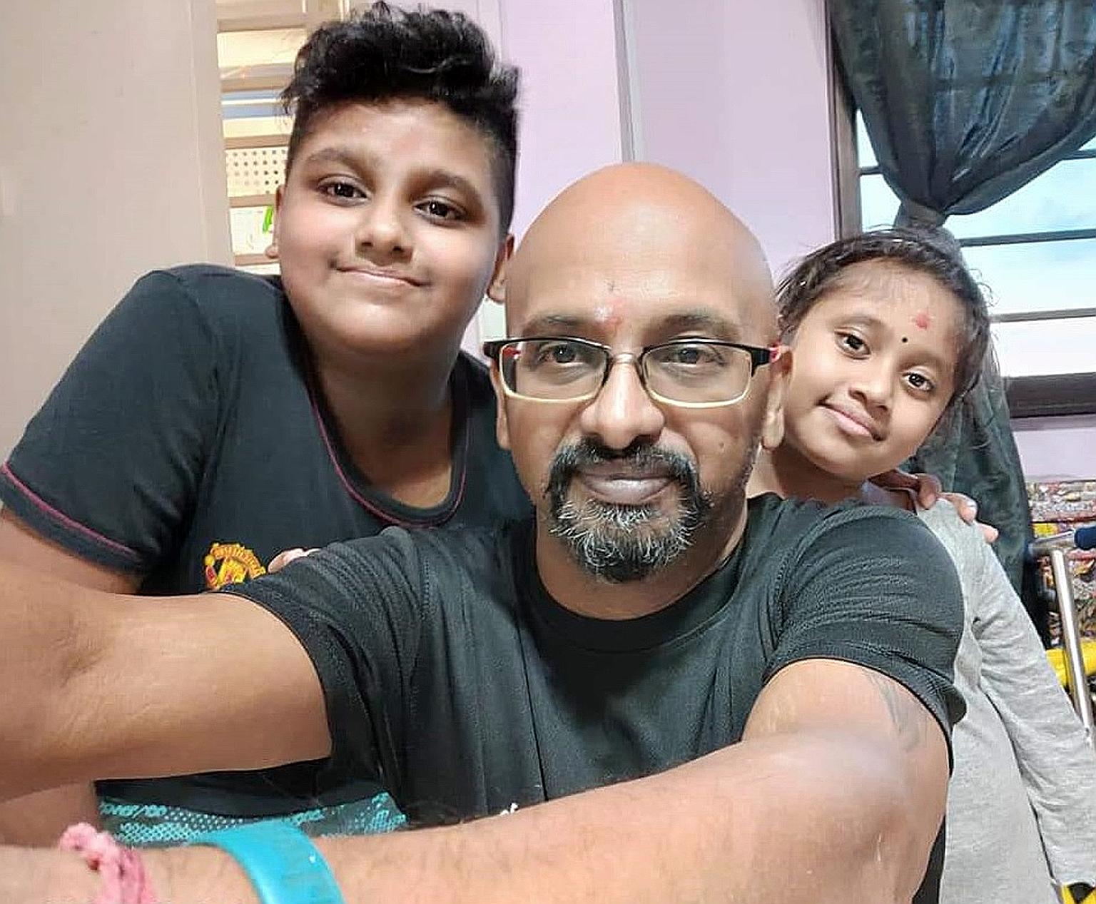 Security guard at work he's both mum and dad at home Singapore tabla ...